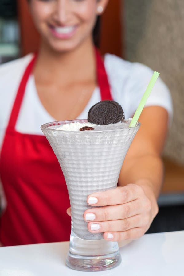 Female Chef Serving Milk Shake Stock Image - Image of milkshake, bakery ...