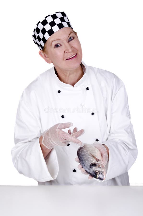 Female Chef Shows on a Fresh Sea Bream Stock Image - Image of person ...