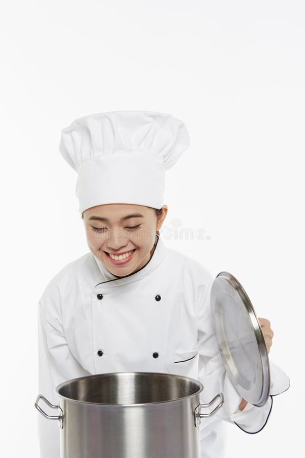 Female Chef Smelling Food from the Pot Stock Photo - Image of food ...