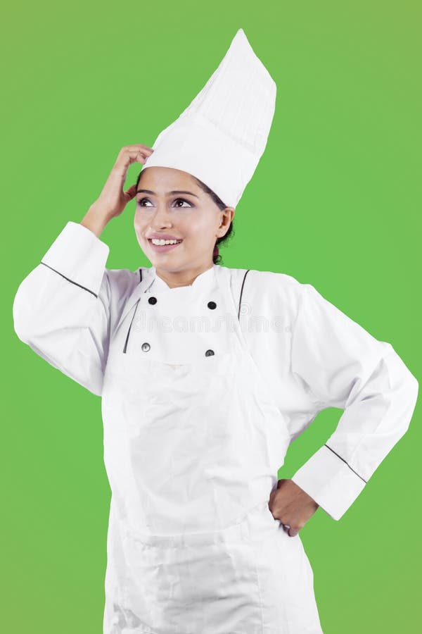 Female Chef Thinking Something in the Studio Stock Photo - Image of ...
