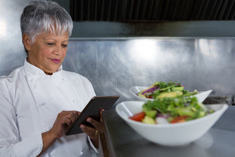 Female Chef Using Digital Tablet Stock Image - Image of plate, digital ...