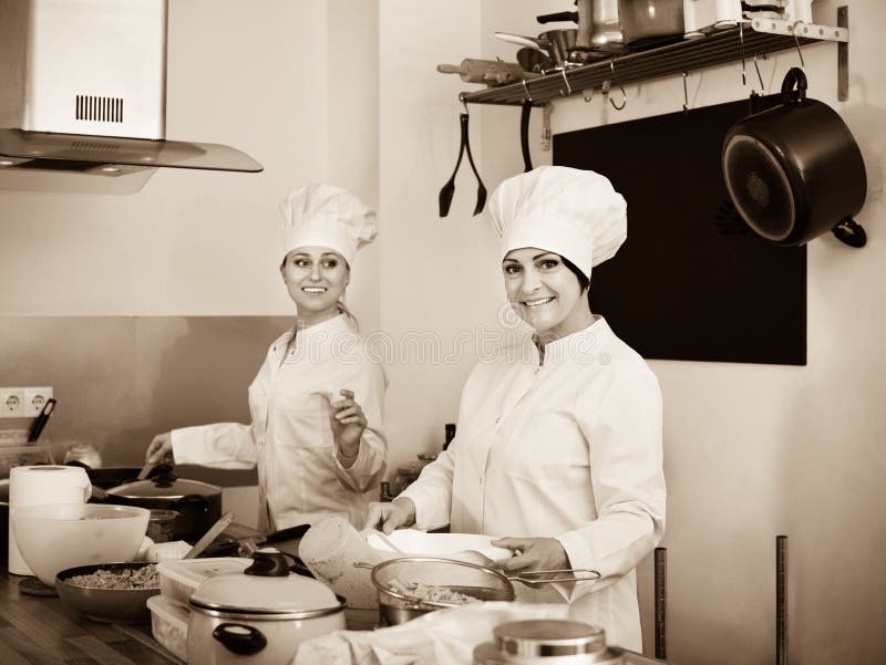 Female Chefs Preparing Food on Restaurant Kitchen Stock Photo - Image ...