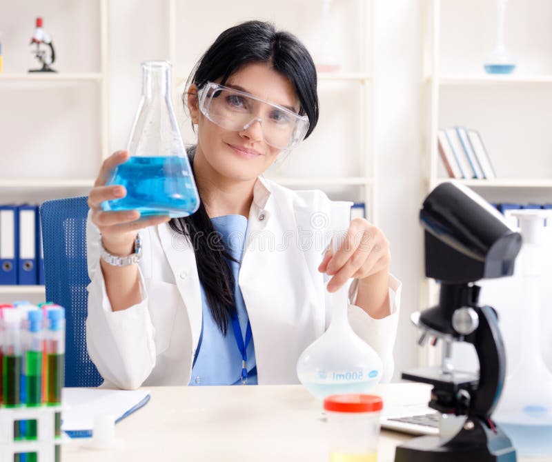 Female Chemist Working at the Lab Stock Photo - Image of biology, glass ...