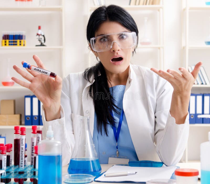 Female Chemist Working at the Lab Stock Image - Image of liquid ...