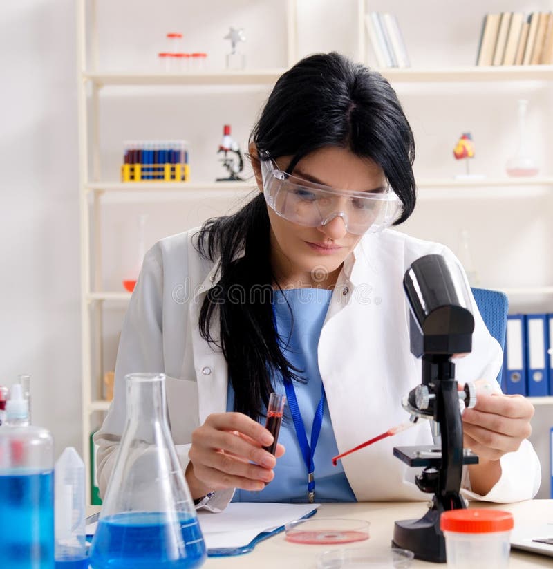 Female Chemist Working at the Lab Stock Photo - Image of discovery ...