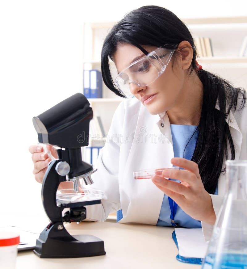 Female Chemist Working at the Lab Stock Image - Image of analyzing ...