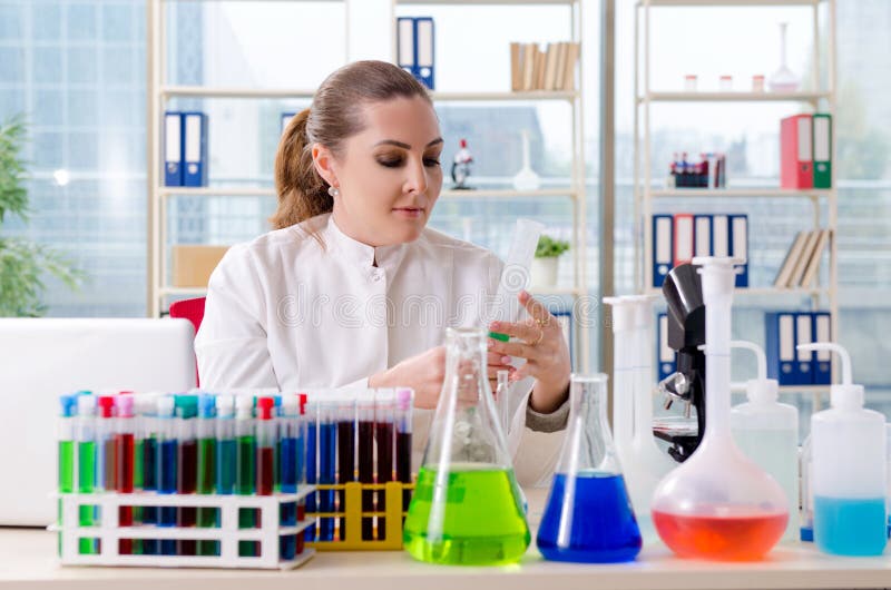 The Female Chemist Working in Medical Lab Stock Image - Image of ...