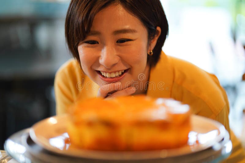 Female choosing a cake stock photo. Image of smile, friend - 238931392