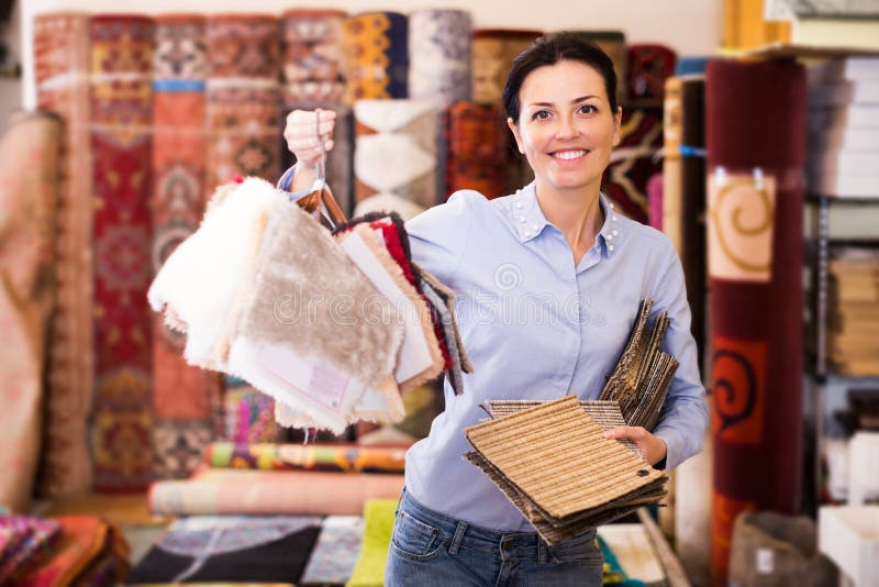 Female Choosing Carpet Samples Stock Photo - Image of carpet, holding ...