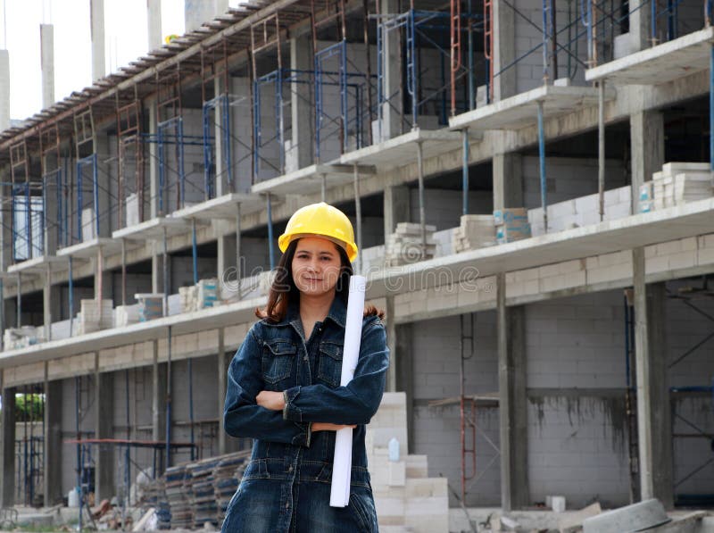 Female Civil Engineer or Architect with Yellow Helmet, Standing and ...
