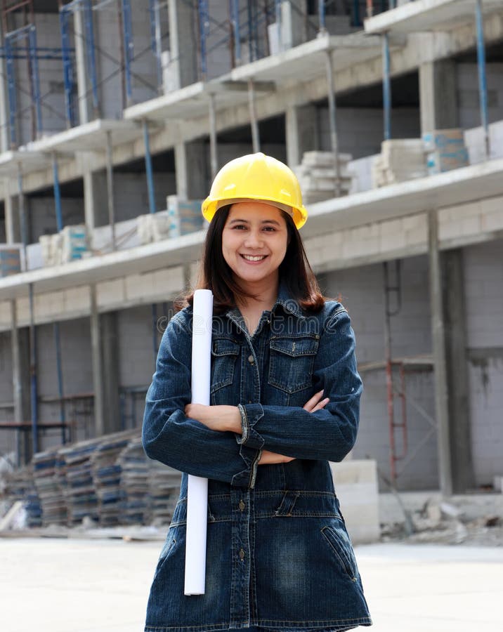 Female Civil Engineer or Architect with Yellow Helmet, Standing and ...