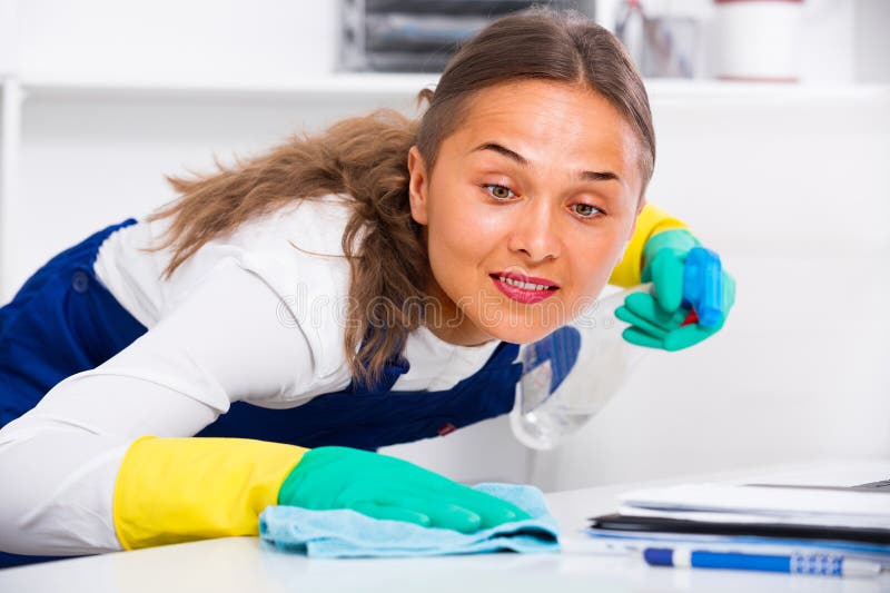 Female cleaner with duster stock photo. Image of detergent - 293407326