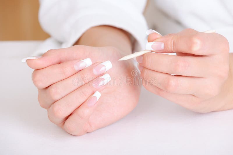 Female Cleaning Under Fingernails with a Stick Stock Image - Image of ...