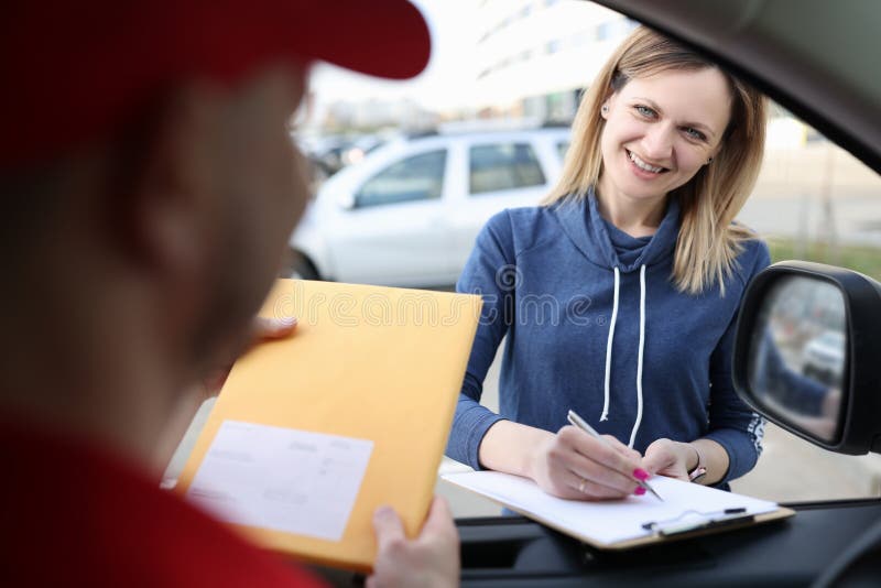 Female Client Puts Signature on Documents when Receiving Parcel from ...