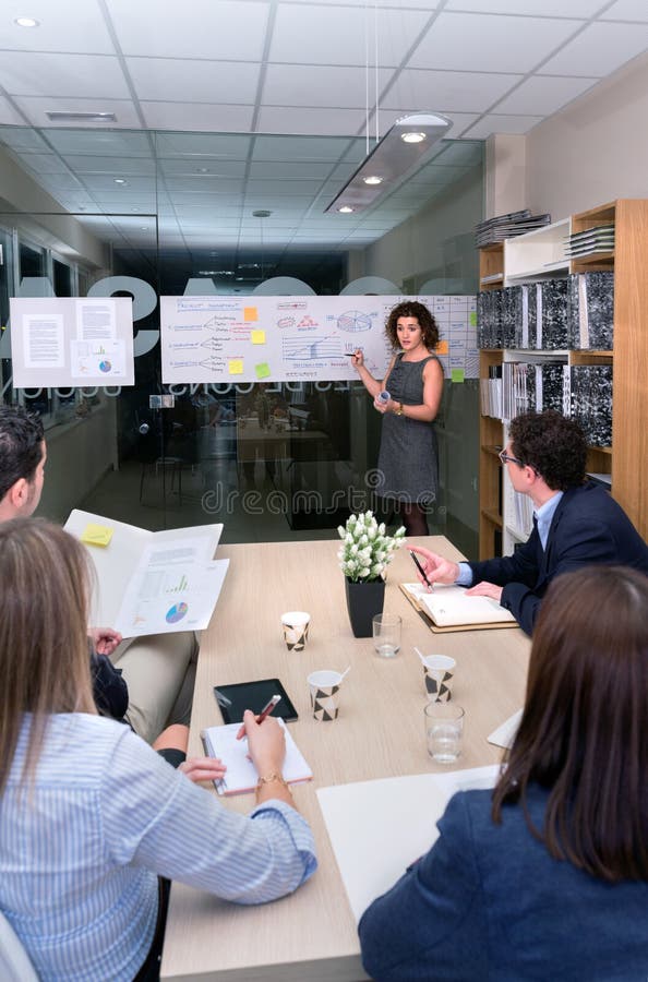 Female Coach Training Business Team at Headquarters Stock Photo - Image ...