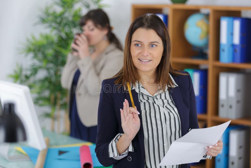 Female colleague in office stock photo. Image of corporate - 127756910