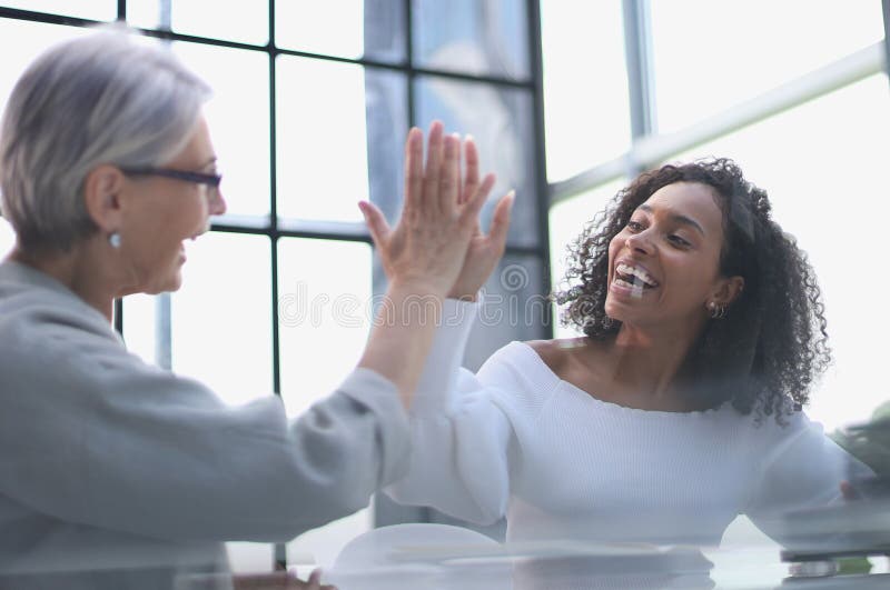 Female Colleagues of Different Nationalities and Ages Met in the Office ...