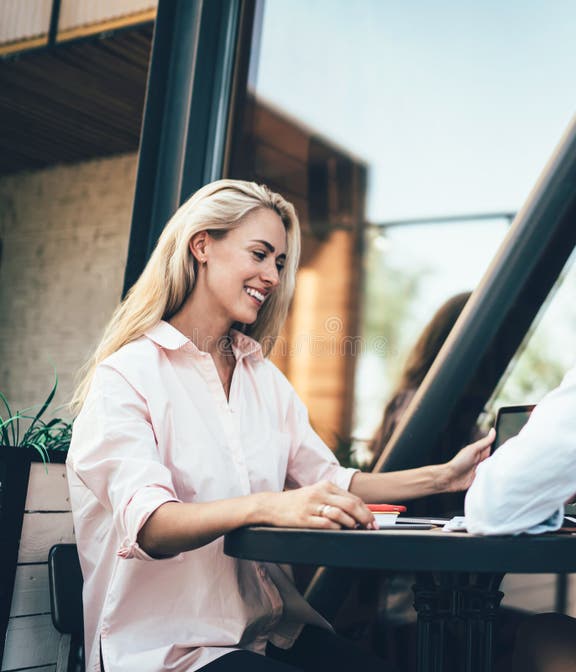 Female Colleagues Discussing Work during Lunch Break Stock Image ...