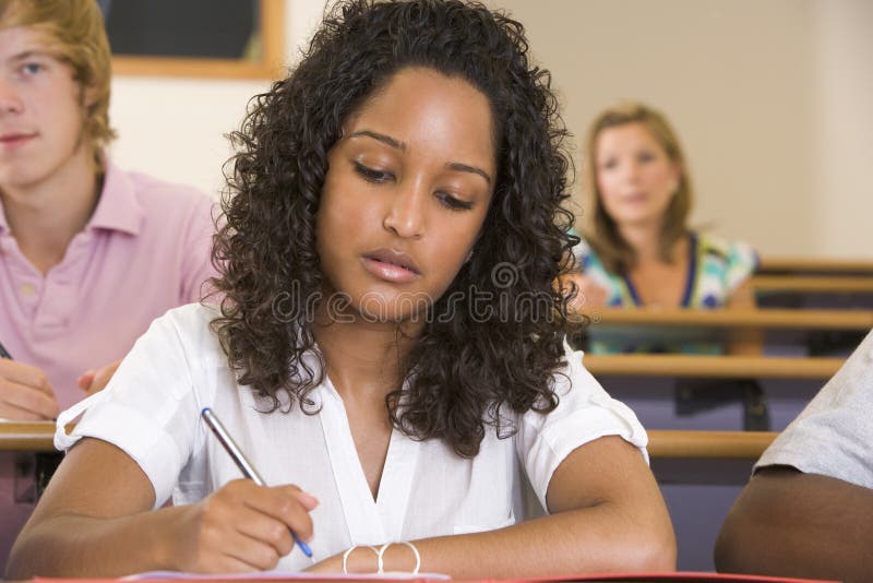 Female College Student Listening To a Lecture Stock Image - Image of ...