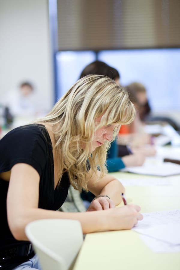 Female College Student Sitting in a Classroom Stock Image - Image of ...