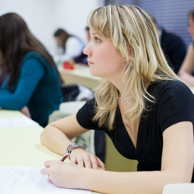 Female College Student Sitting in a Classroom Stock Photo - Image of ...