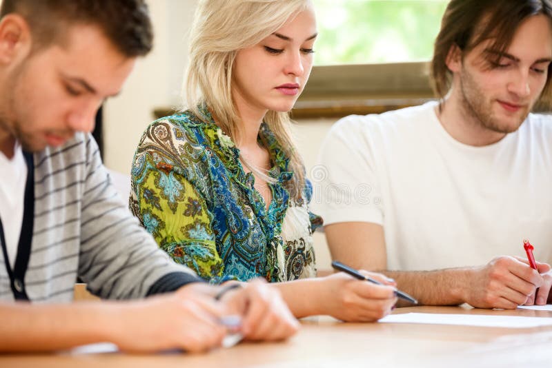 Exam Classroom Full Students Writing Test Stock Photos - Free & Royalty ...