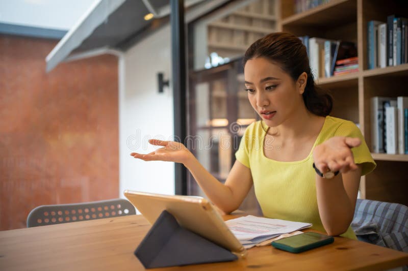 Female College Student Studying and Working Online with Laptop and ...