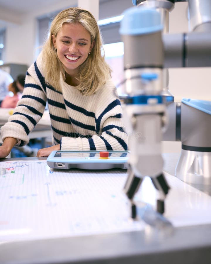 Female College or University Engineering Student in Robotics Class ...