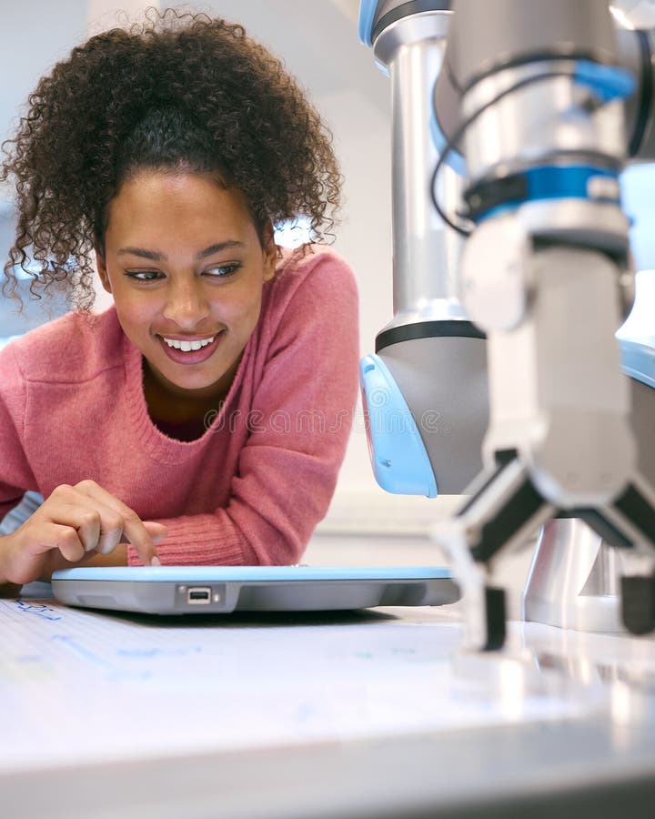 Female College or University Engineering Student in Robotics Class ...