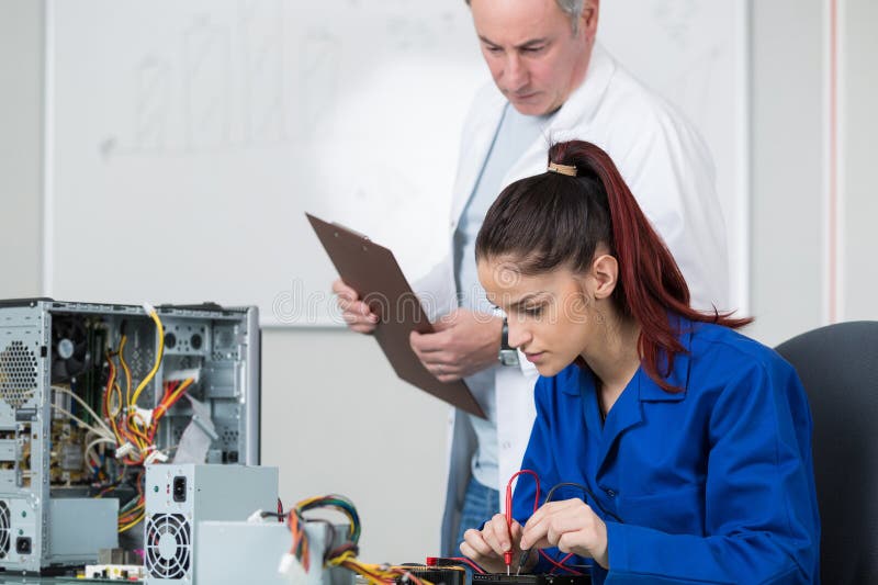 Female Computer Engineer Repairing Computer Stock Photo - Image of ...