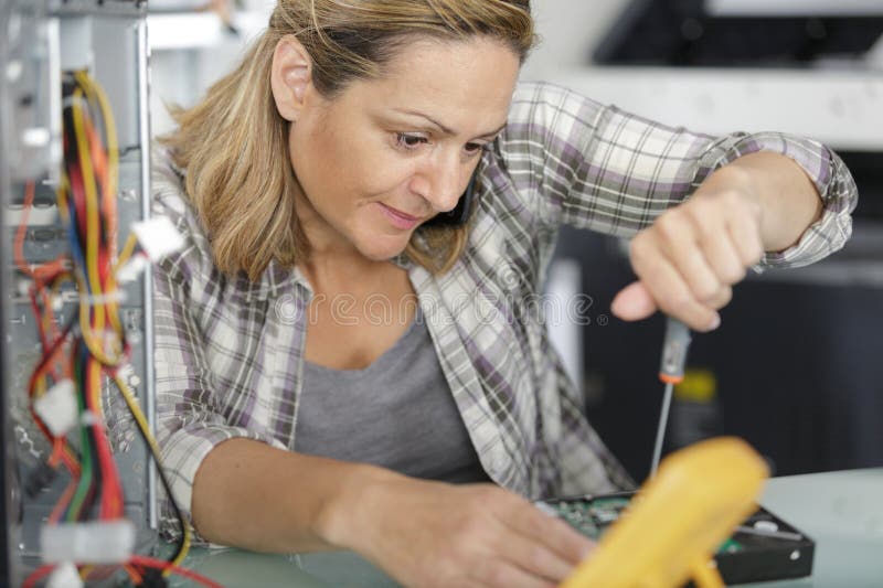 Female Computer Engineer Repairing Broken Desktop Stock Image - Image ...