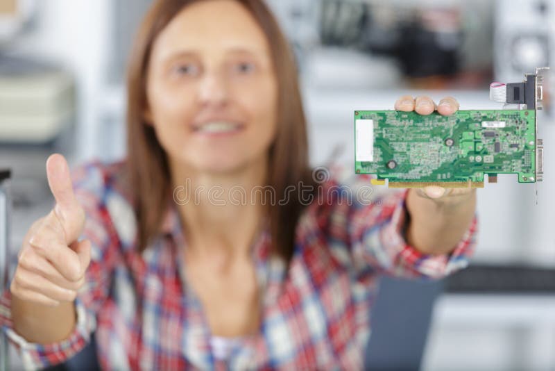 Female Computer Hardware Worker Showing Thumb-up Stock Photo - Image of ...