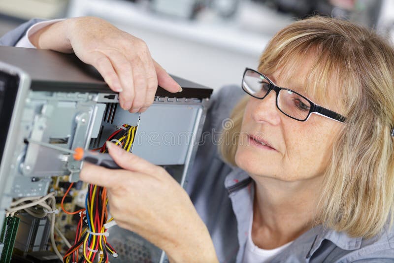 Female Computer Technician Repairing Pc Stock Image - Image of service ...