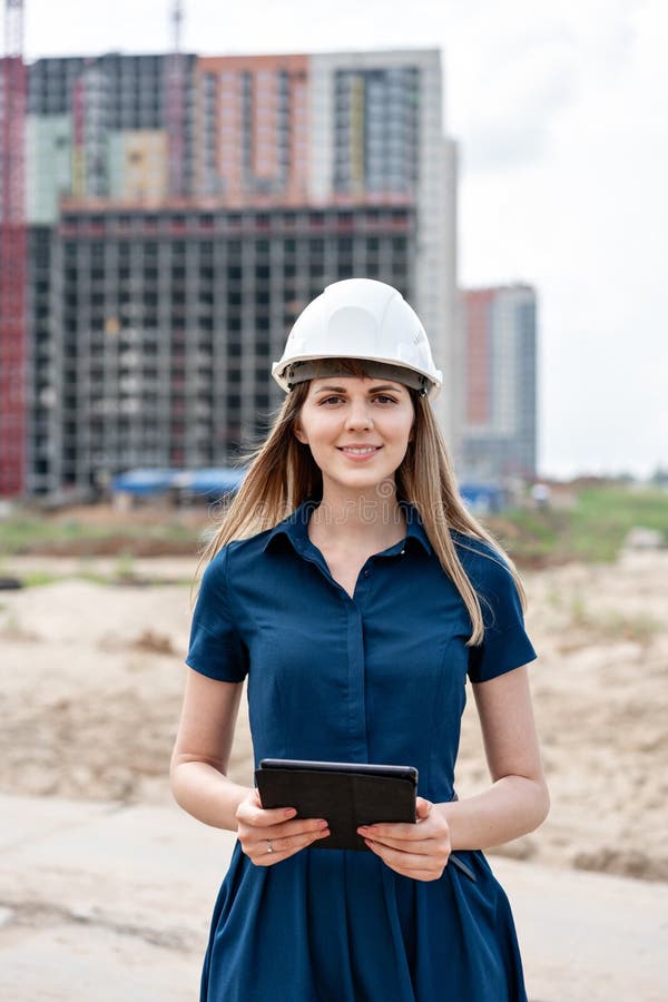 Female Construction Engineer. Architect with a Tablet Computer at a ...