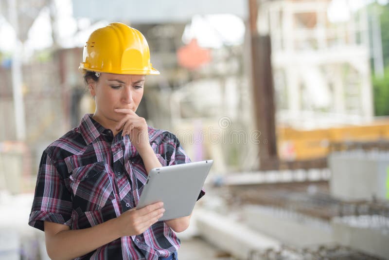 Female Construction Engineer Working on Tablet at Site Stock Image ...