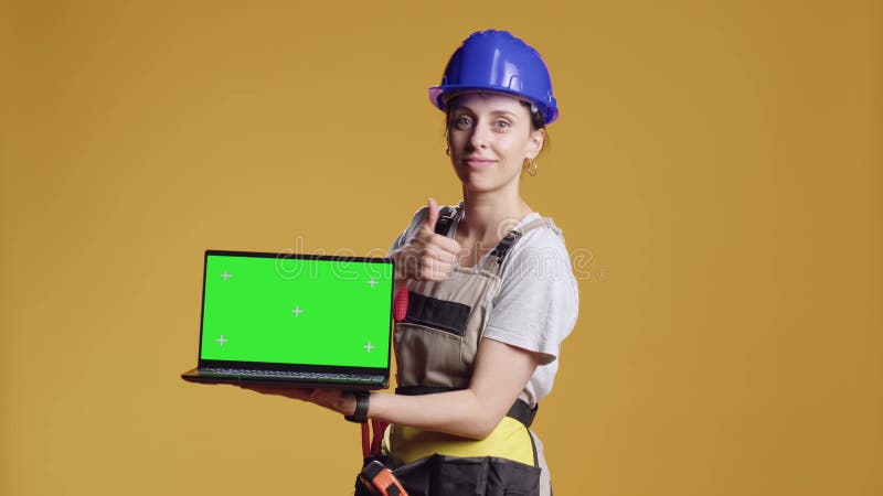 Female Construction Worker Holding Laptop with Greenscreen Stock Video ...
