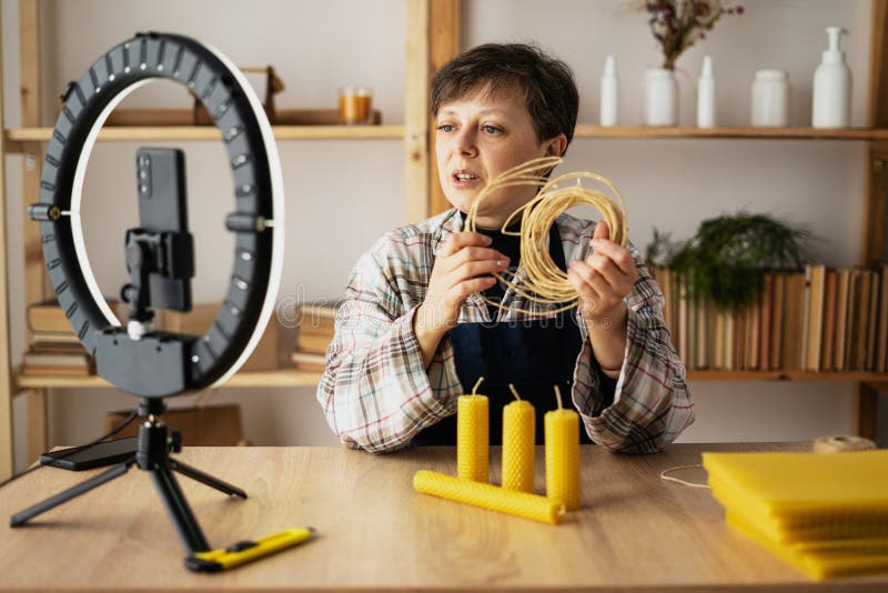 Female Content Creator Using Smartphone and Ring Light Record Video ...