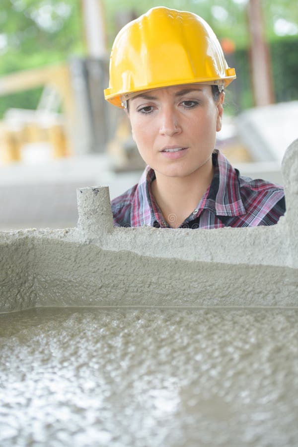 Female Contractor Looking At Hopper Cement Stock Photo - Image of ...