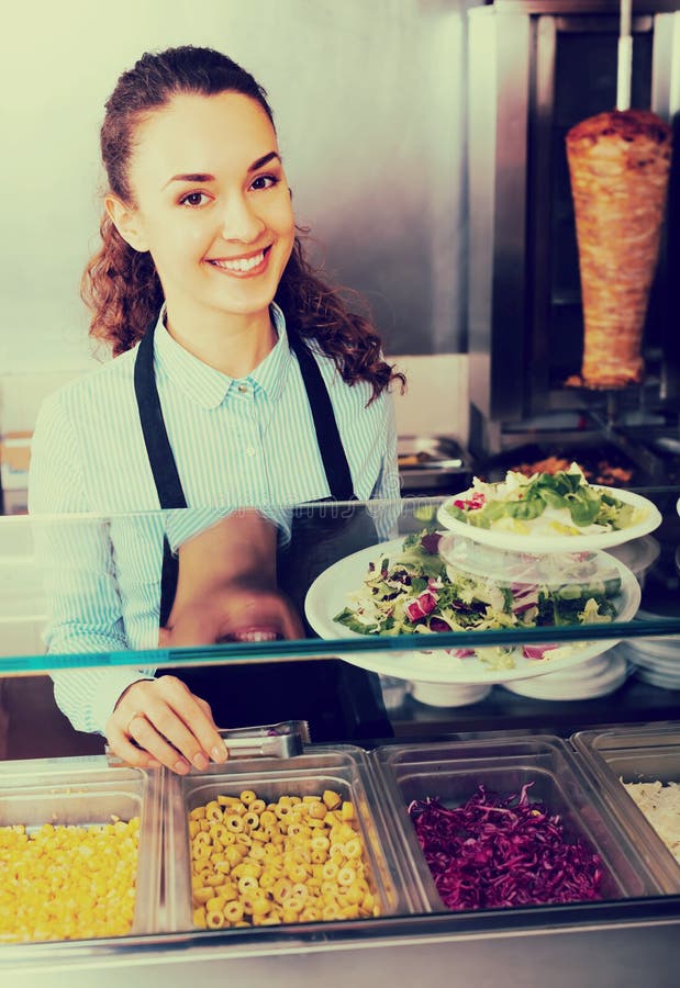 Female cook at bistro stock photo. Image of portrait - 80811342