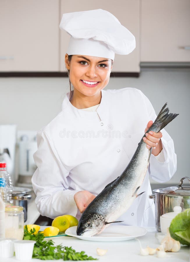 Female Cook Preparing Big Fish Stock Image - Image of professional ...