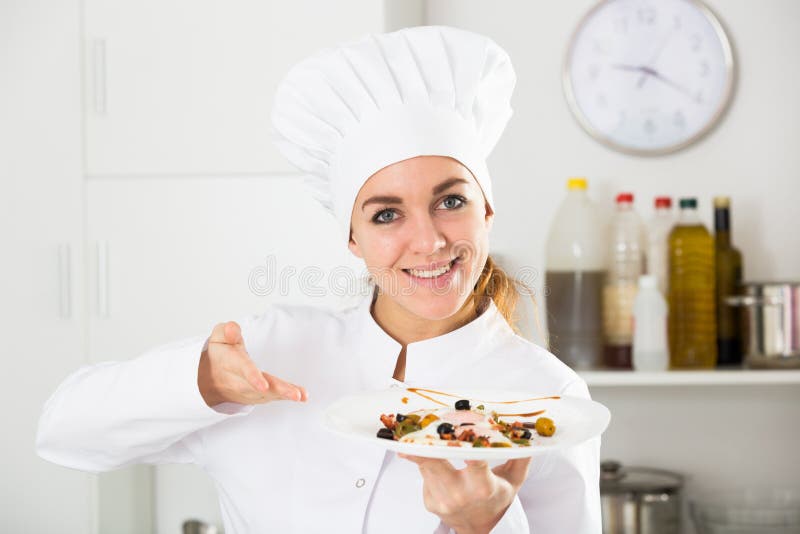 Female cook preparing food stock photo. Image of hardworking - 179667504