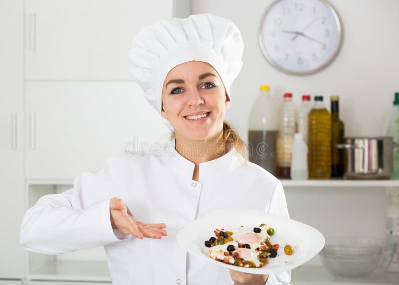 Female cook preparing food stock photo. Image of food - 277905812