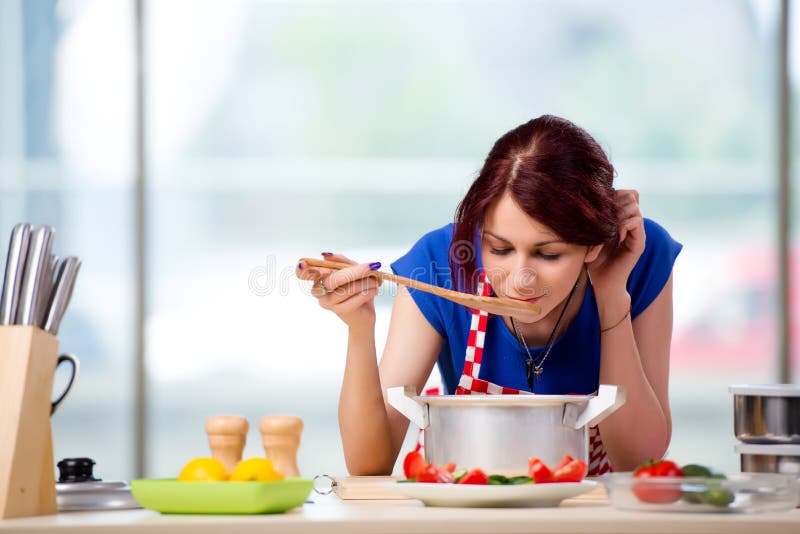 The Female Cook Preparing Soup in Brightly Lit Kitchen Stock Image ...
