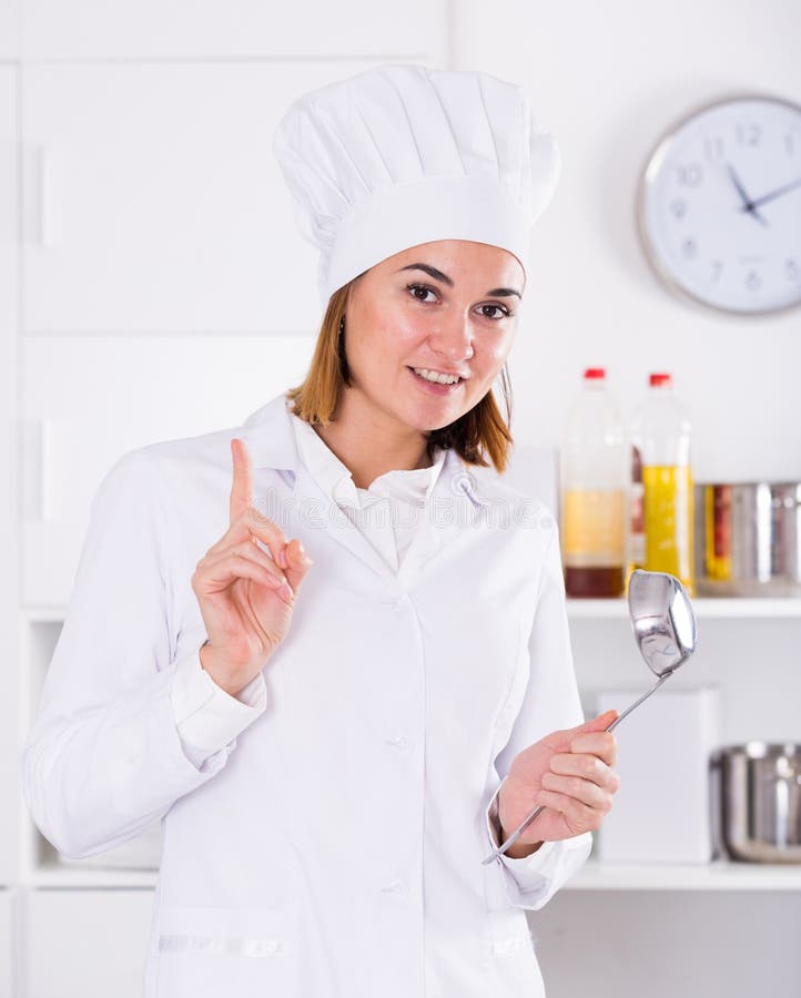 Female cook at work stock image. Image of profession - 93055219