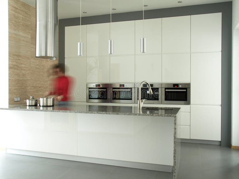 Female Cooking in Modern Kitchen Interior Stock Photo - Image of light ...