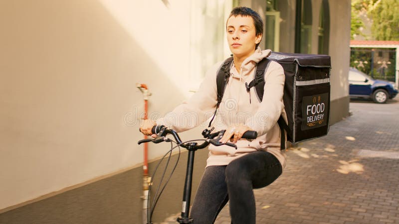 Female Courier Going To Client Front Door And Delivering Lunch Meal Stock Image Image Of