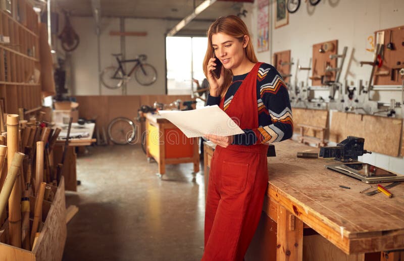 Female Craftsman in Carpentry Workshop for Bamboo Bicycles Making Call ...