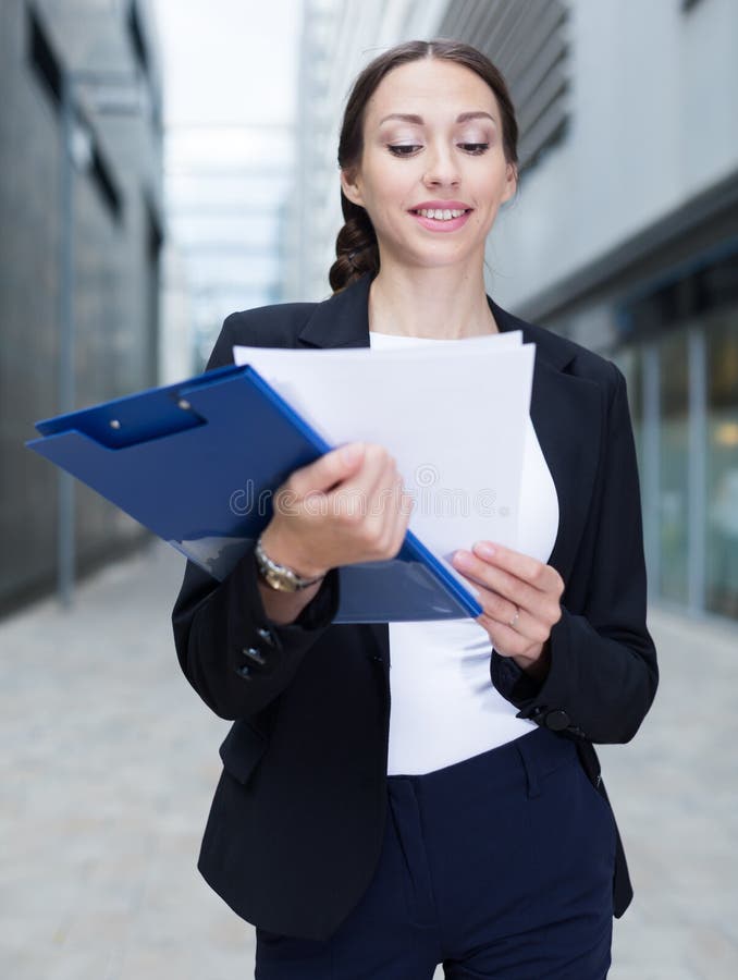 Female Creative Director is Examining Documents Stock Photo - Image of ...