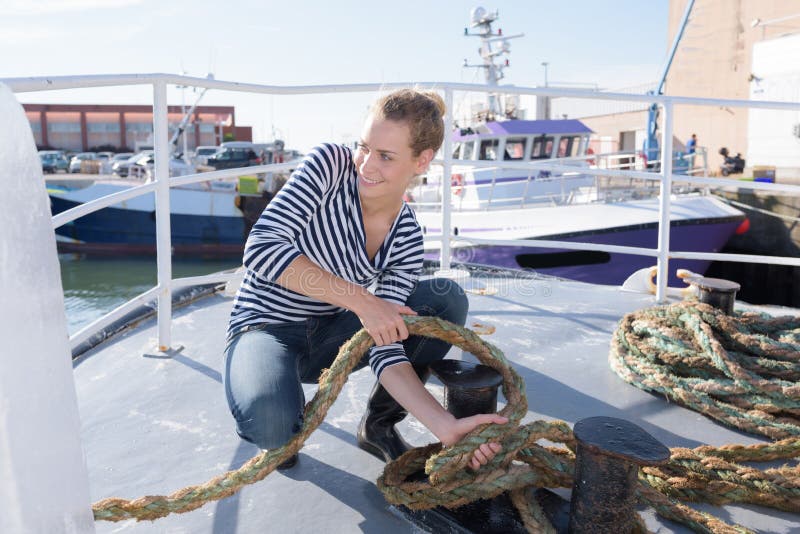 Female Crew Working with Yacht Stock Photo - Image of water, worker ...