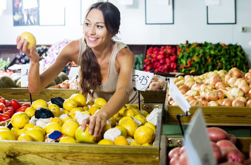 Female Customer Buying Lemons on Fruit Market Stock Image - Image of ...